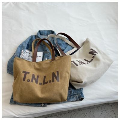 China Minimalist Large Tote Bag for Women Cotton Canvas Messenger Crossbody Purse for sale