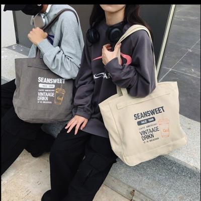 중국 주머니 가 있는 중형 토트 핸드백 판매용