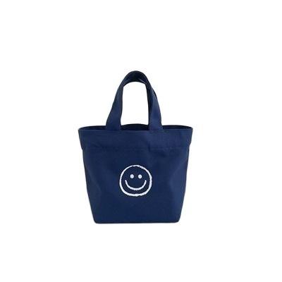 China Bolso de compras de lienzo de algodón mini reutilizable y elegante Bolso de mano para la vida escolar diaria en venta