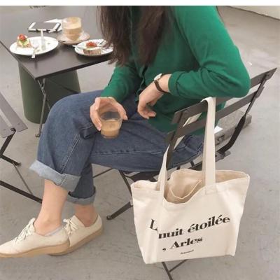 China Bolsa de ropa de lienzo de color personalizado para necesidades de compras de gran capacidad en venta