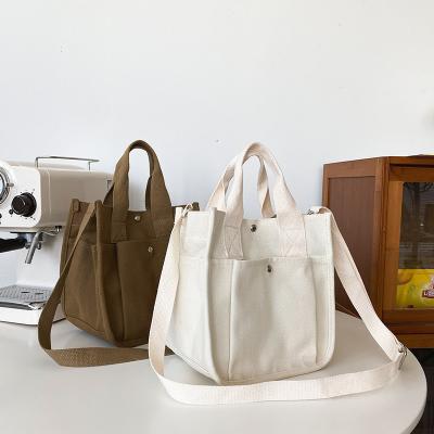 중국 선물 내구성 면화 캔버스 쇼핑 토트 가방 크로스 보디 스트랩과 여러 주머니 판매용