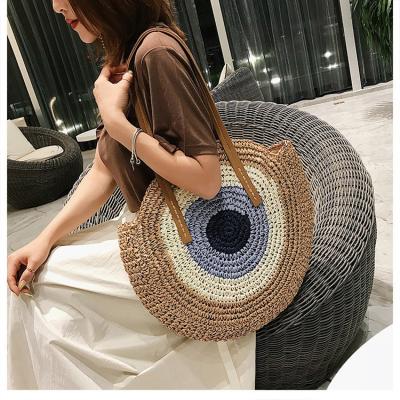 중국 2022 핸드웨이브 둥근 해변 어깨 가방 가죽 손잡이 및 사용자 지정 로고와 함께 빨대 가방 판매용