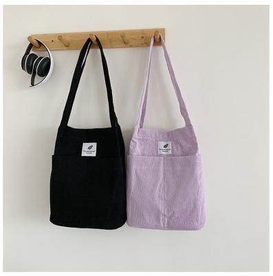 China Trendy Large Custom Logo Letter Print Cotton Tote Bag Solid Color Corduroy Canvas Bag for sale