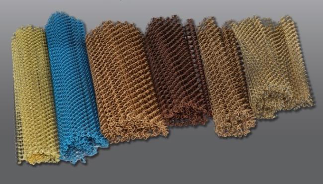 Modern interior design using chain link mesh drapery