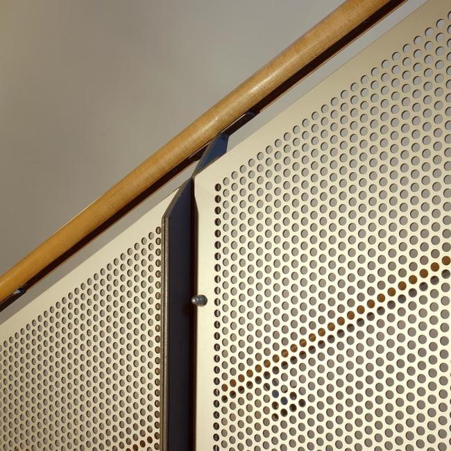 Close-up view of galvanized perforated metal sheet