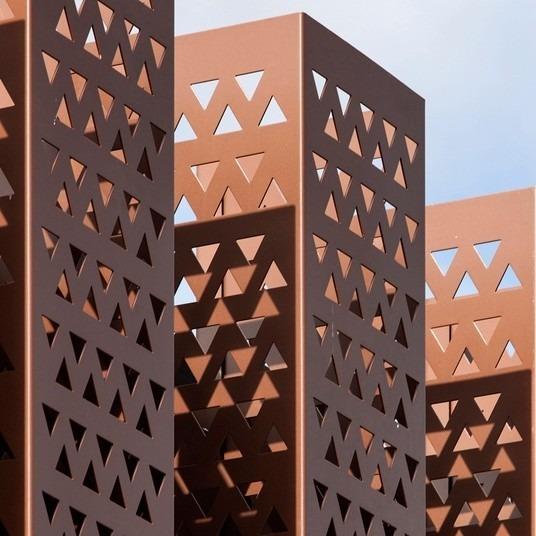 Perforated metal mesh sample showing square hole pattern