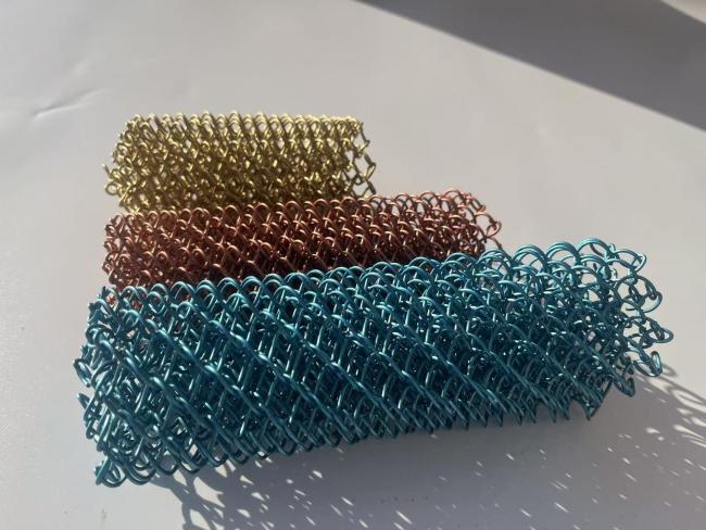 Colorful chain link mesh drapery installation example