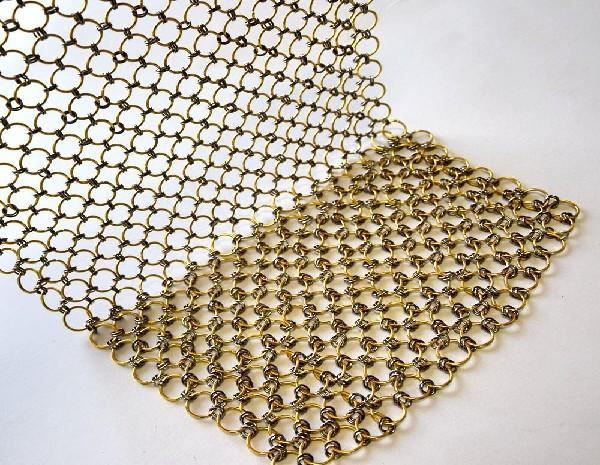Woven chain link curtain wire mesh close-up texture