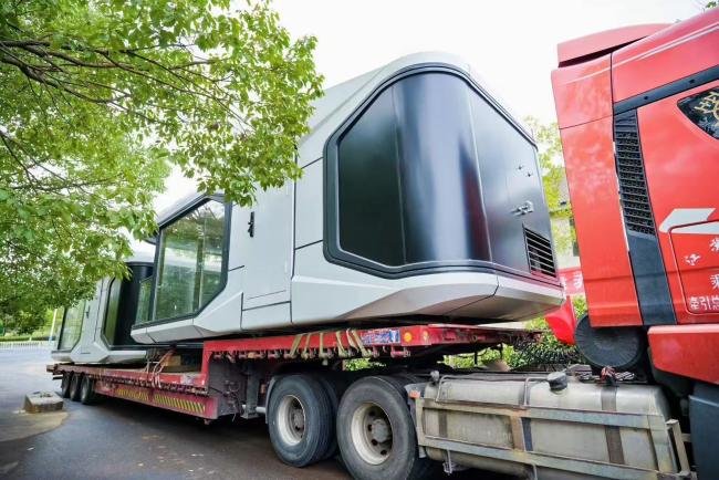 E7 Luxury Space Capsule House exterior view showing modern design and panoramic windows
