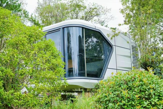 E7 Space Capsule interior layout showcasing modern living space and amenities