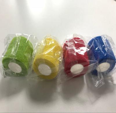 China 2.5cm*4.5m Non-woven fabric cohesive bandage paw printed tape vet tape wrap no residue leaves on body not sticky to hair for sale