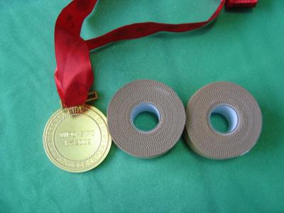 China 5cm*13.7m  Athletic sports tape Professional quality Rigid Strapping sports tape factory supply latex free flesh color for sale