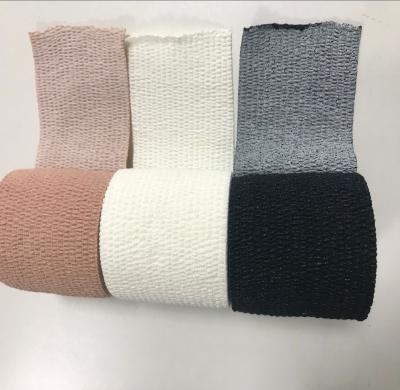 China Light Weight Stretch elastic adhesive bandage China  white skin black color 5cm*4.5m CEapproved zinc oxide latex free for sale