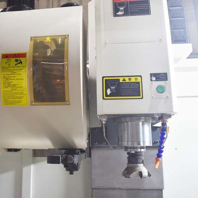 China Zet de volledig Ingesloten Verticale CNC het Machinaal bewerken de Centrumcarrousel/Partij Hulpmiddelwisselaar op Te koop