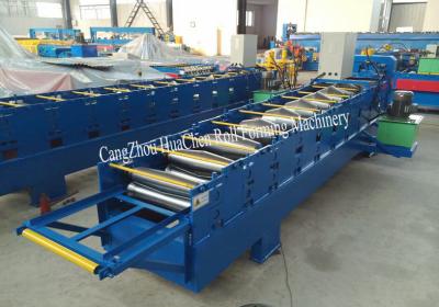 China Color Coated Galvanized Ridge Cap Roll Forming Machine Two Output Tables for sale