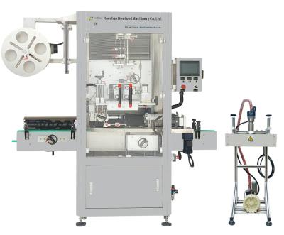 China PLC Controlled Automatic Sleeve Shrink Label Machine for Plastic Bottles for sale