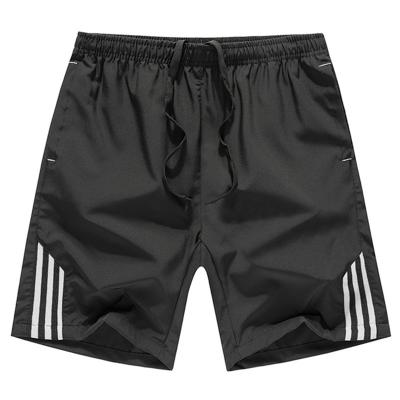 Cina L'allenamento degli uomini del poliestere mette più i pantaloni maschii comodi della spiaggia di dimensione in vendita
