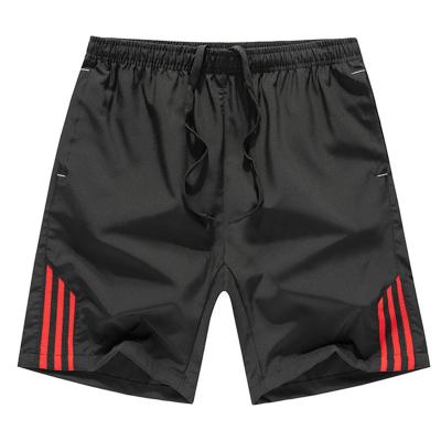 Cina L'allenamento degli uomini del poliestere mette più i pantaloni maschii comodi della spiaggia di dimensione in vendita