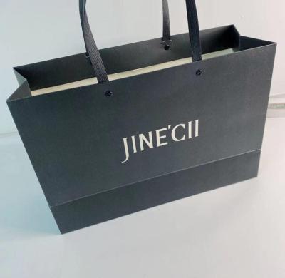 Cina Matt Laminated Kraft Paper Shopping insacca con le stampe offset della maniglia in vendita