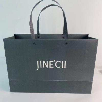 Cina Matt Laminated Kraft Paper Shopping insacca con le stampe offset della maniglia in vendita