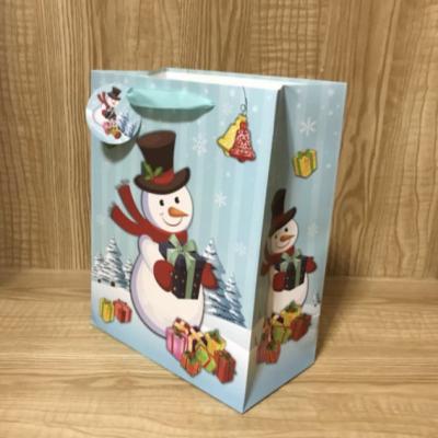 Cina Sacchi di carta UV di Natale del punto dell'avorio con stampa di colori di Pantone delle maniglie in vendita