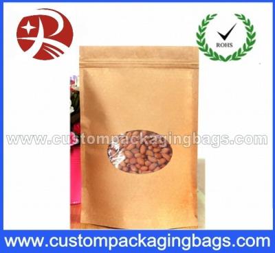 China Laminated Zip Lock Kraft Paper Stand Up Pouches For Food With Ground Clear Window for sale