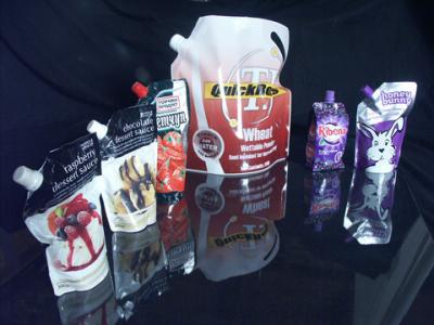 China Side Gusset PET / AL / NY / PE Standing Spout Pouch with Handle for Moisture Proof Packing for sale