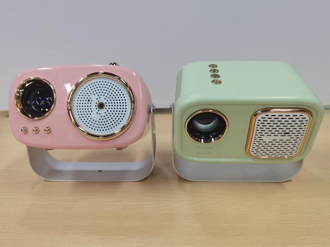 K1 Green 720P Mini Projector showing versatile projection angles