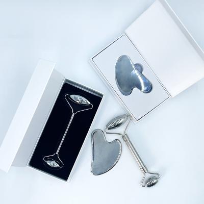 Cina Massaggio del viso per la sanità Roller oro in acciaio inossidabile Gua Sha Set per collo e viso in vendita