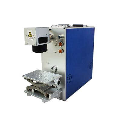 China Easy To Transport Laser Marking Machine Handheld Engraving Machine For Metal for sale