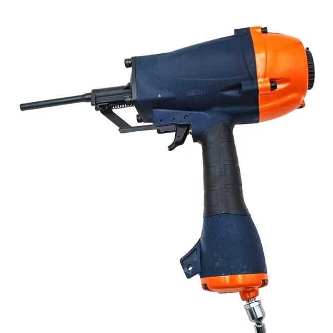 Side view of pneumatic nail gun showing air connection point