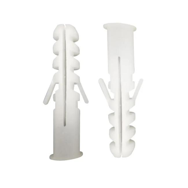 Various sizes of plastic expansion nail plugs displayed in packaging