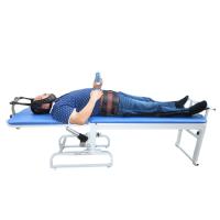 China Computer-Controlled Intervertebral Disc Herniation Traction Table with 1-99kg Tension & 225kg Capacity for Cervical/Lumbar Therapy for sale