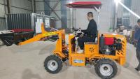 China Four Wheel Drive Mini Tractor Loader 400kg Capacity 2.3m Lifting Height Small Skid Loader for sale