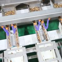 China Quick walnut kernel sorting machine with 8-camera AI classification and centroid algorithm, reducing production rework at 560–720 kg/h for sale