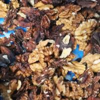 China Quick walnut kernel sorting machine with 8-camera AI classification and centroid algorithm, reducing production rework at 560–720 kg/h for sale