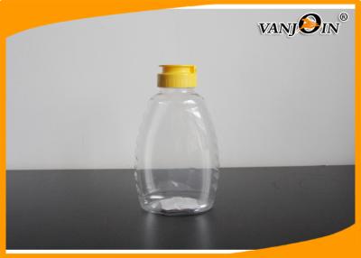 Cina 720ml BPA liberano i barattoli di plastica trasparenti dell'alimento per miele d'imballaggio con il cappuccio di compressione in vendita