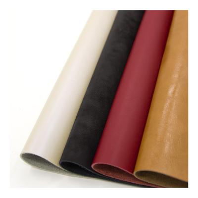 Cina Cow Leather Fabric Printed Faux Recycled PU Leather Fabric Abrasion-Resistant in vendita