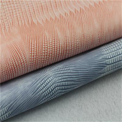 Cina Abrasion-Resistant Synthetic Lizard Snack Skin Patterned Woven Crumpled PU Leather For Shoes in vendita