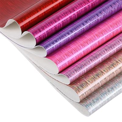 Cina Waterproof PVC Glitter Film Laminated Leatherette Fabric Faux Leather For Kids Bags Shoes Luggage in vendita