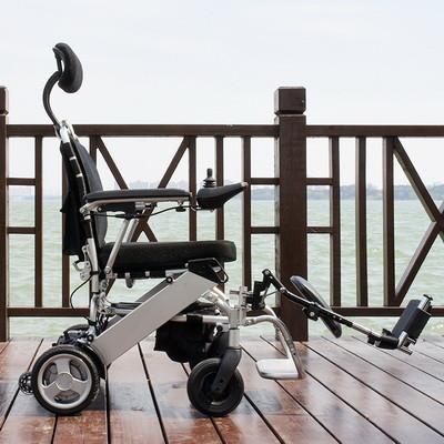 China 6km/H Portable Foldable Electric Wheelchair Lightweight Motorized Folding Wheelchair With Patented Design for sale