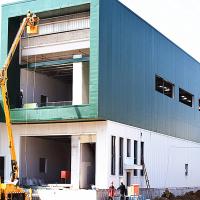 China Customizable Steel Frame Warehouse Workshop with 120m Clear Span and Thermal Insulation for Industrial Use for sale