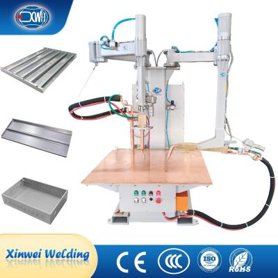China Moving Workpiece Type Flexible Rocker Platform Spot Welding Machine for Steel Doors for sale