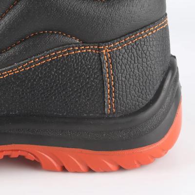 Cina Calzature da uomo in cuoio in acciaio / di piastra di acciaio Scarpe da inverno resistenti allo slittamento in vendita