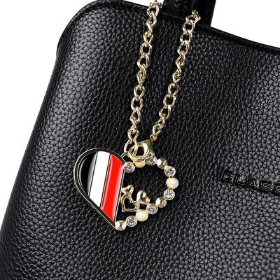 China Medium Size Women's Leather Handbag Designer Shoulder Bag with Geometric Pattern for sale