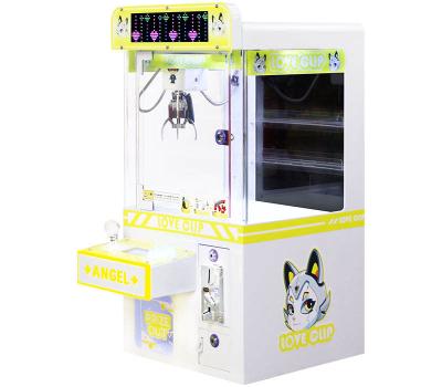 China LED Light Mini Claw Machine Hardware Cabinet With Plush Toys And Keychains for sale