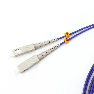 Cina Colore porpora a fibra ottica duplex 50/125 2.0mm di millimetro OM2 del cavo di toppa dello Sc LC di KEXINT 3m LSZH in vendita