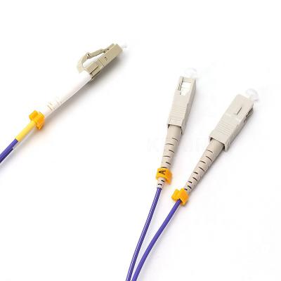 Cina Colore porpora a fibra ottica duplex 50/125 2.0mm di millimetro OM2 del cavo di toppa dello Sc LC di KEXINT 3m LSZH in vendita