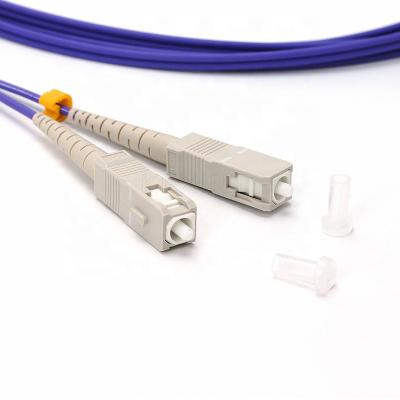 Cina Colore porpora a fibra ottica duplex 50/125 2.0mm di millimetro OM2 del cavo di toppa dello Sc LC di KEXINT 3m LSZH in vendita