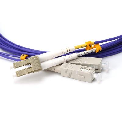Cina Colore porpora a fibra ottica duplex 50/125 2.0mm di millimetro OM2 del cavo di toppa dello Sc LC di KEXINT 3m LSZH in vendita